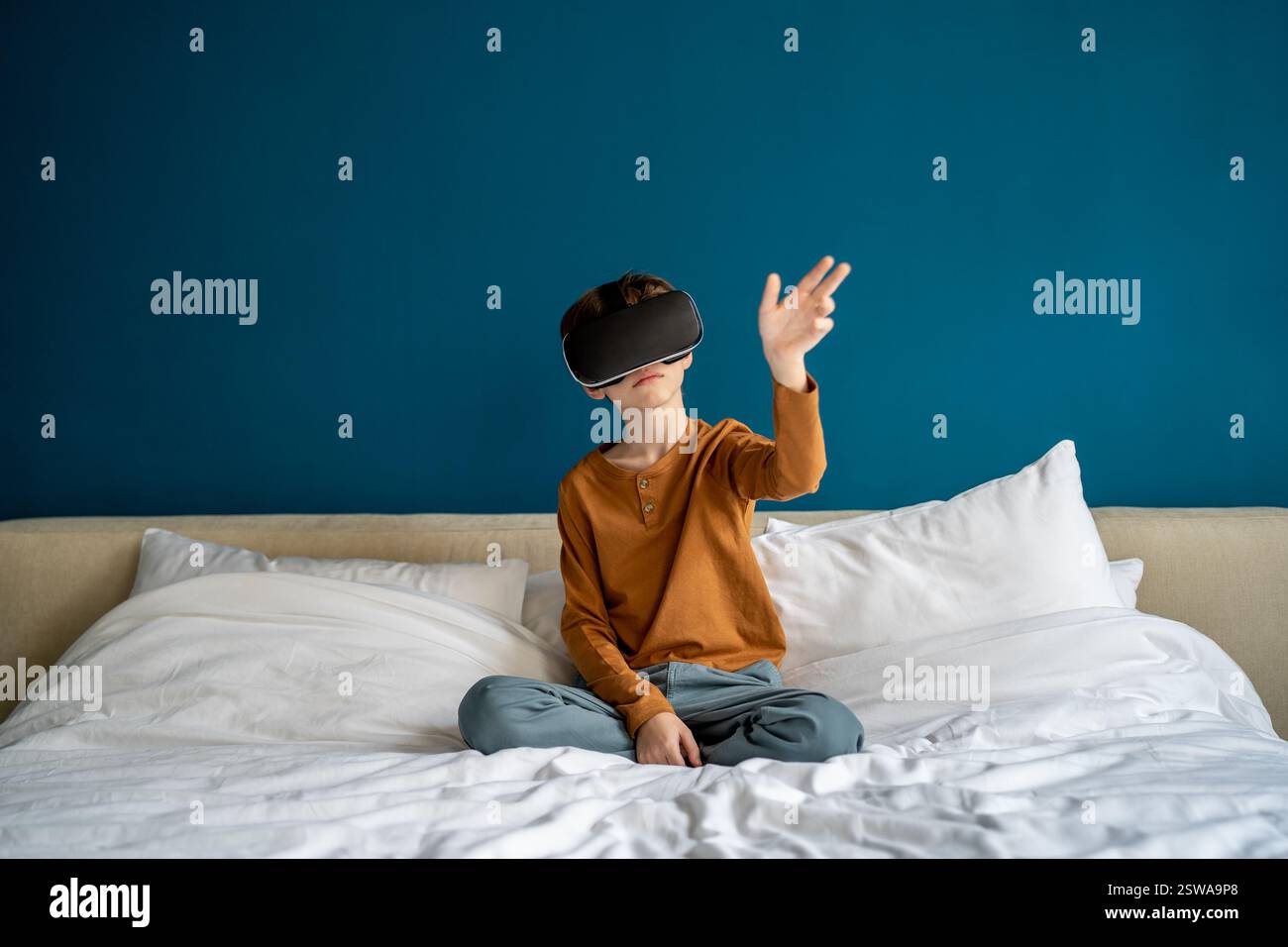 Inspired interested kid boy experience virtual reality goggles ...