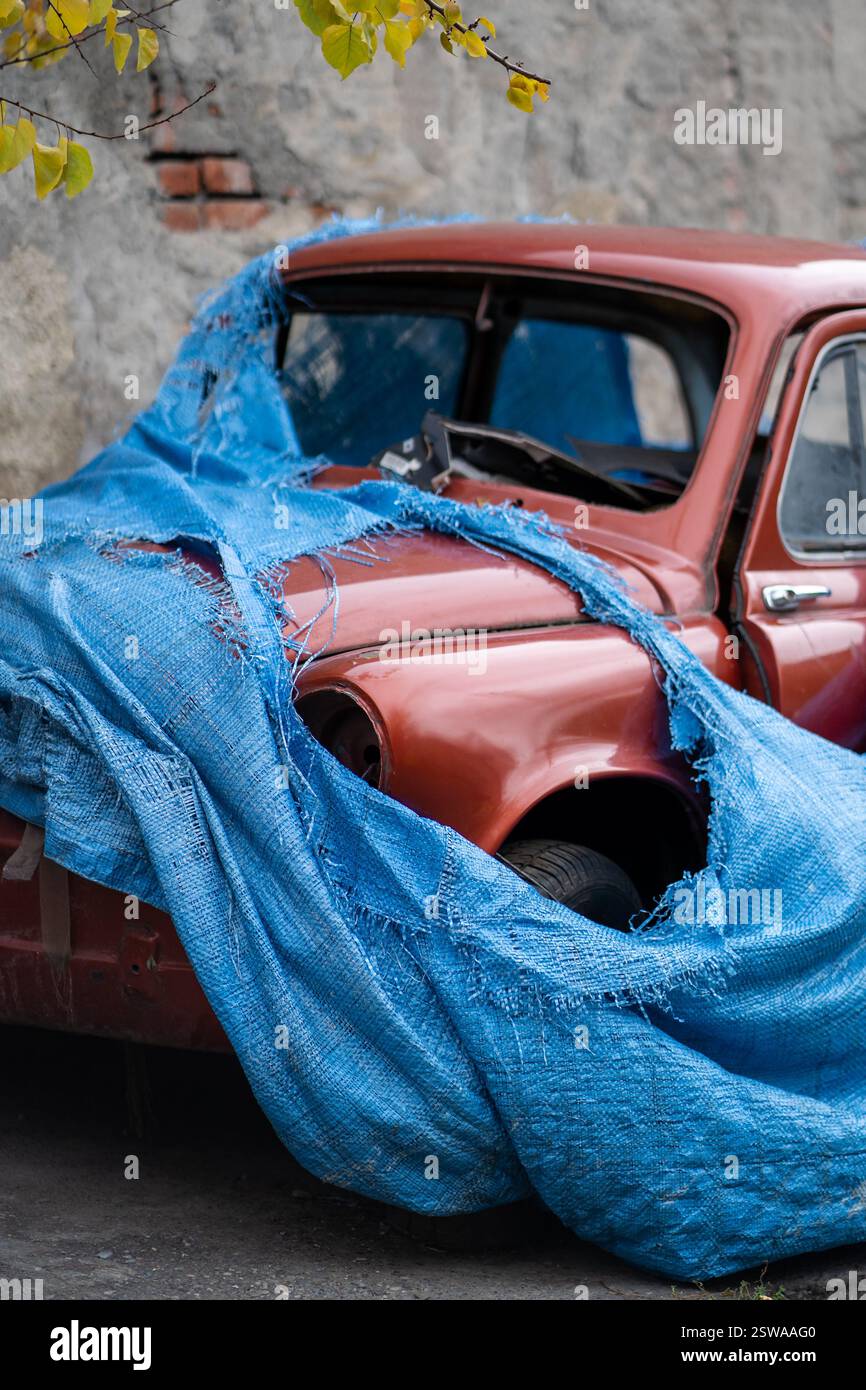 Old broken vintage car at dump, auto recycling Stock Photo - Alamy