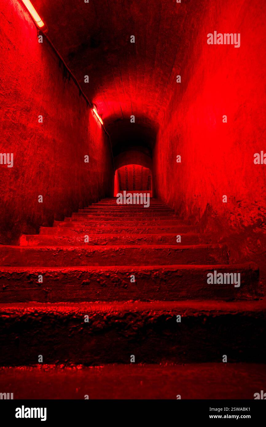 Leading forward along stone wall eerie glow hi-res stock photography ...