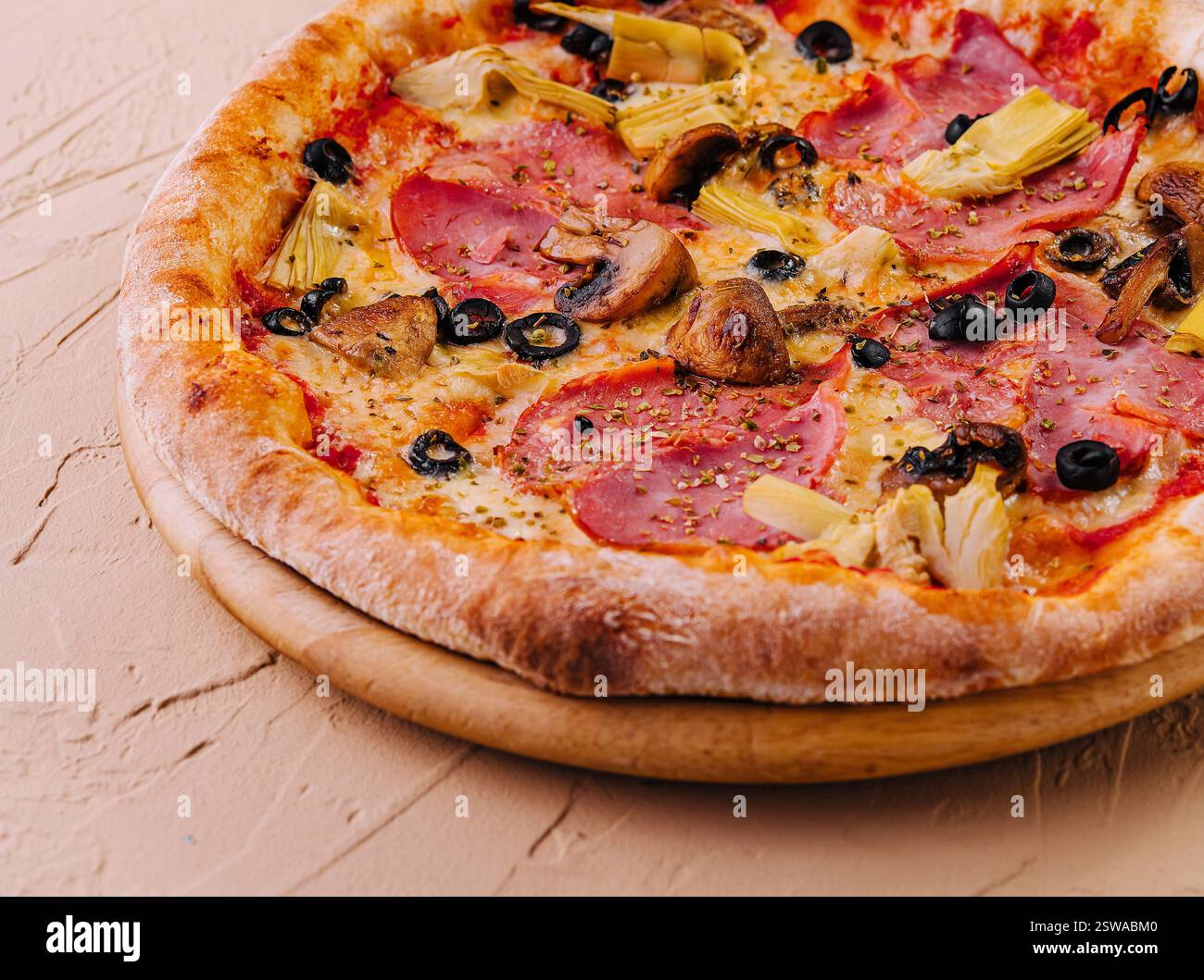 Delicious italian meat pizza with toppings Stock Photo - Alamy