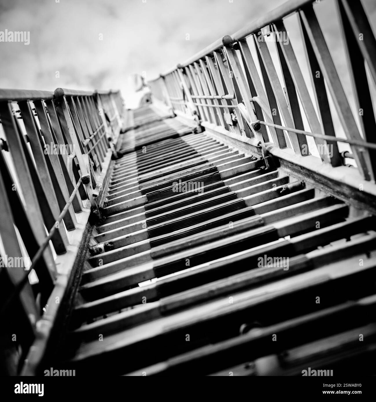 Abstract view through a ladders of fire truck. Black and white processing Stock Photo - Alamy