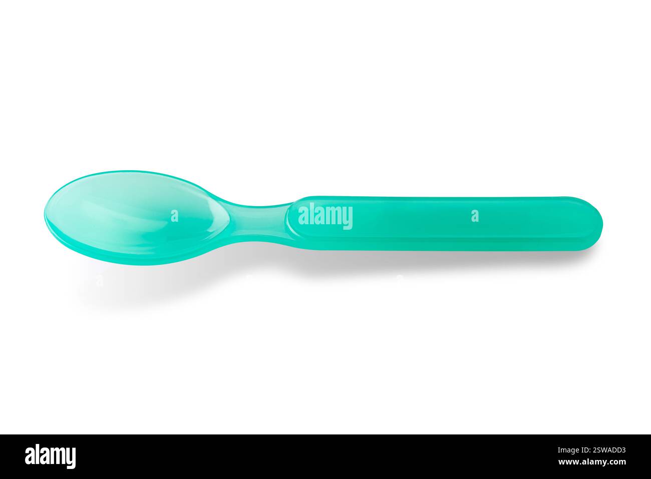 Baby plastic spoon, green small spoon for children isolated on white ...