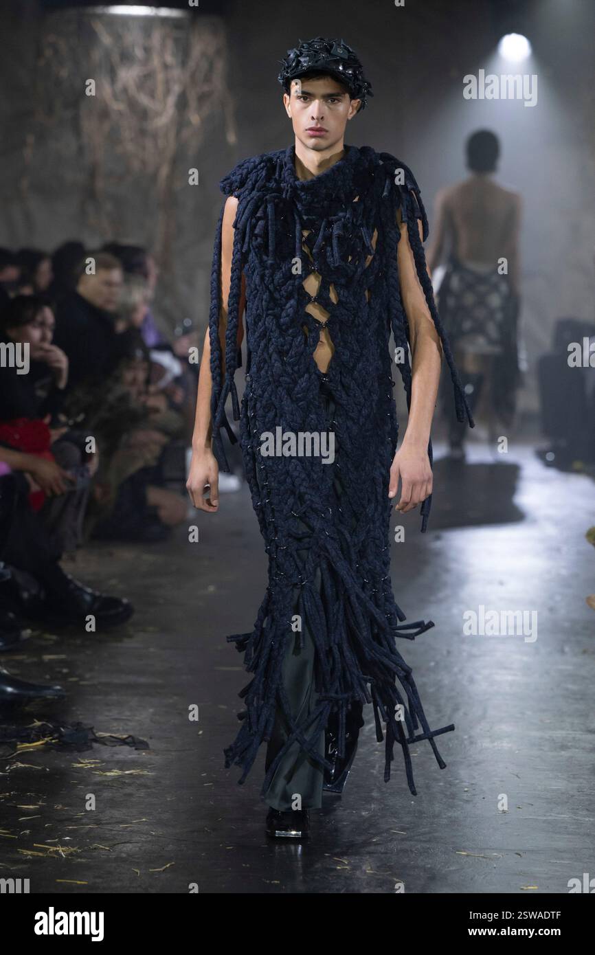 London, UK. 20th Feb, 2025. A model walks on the runway during the ...