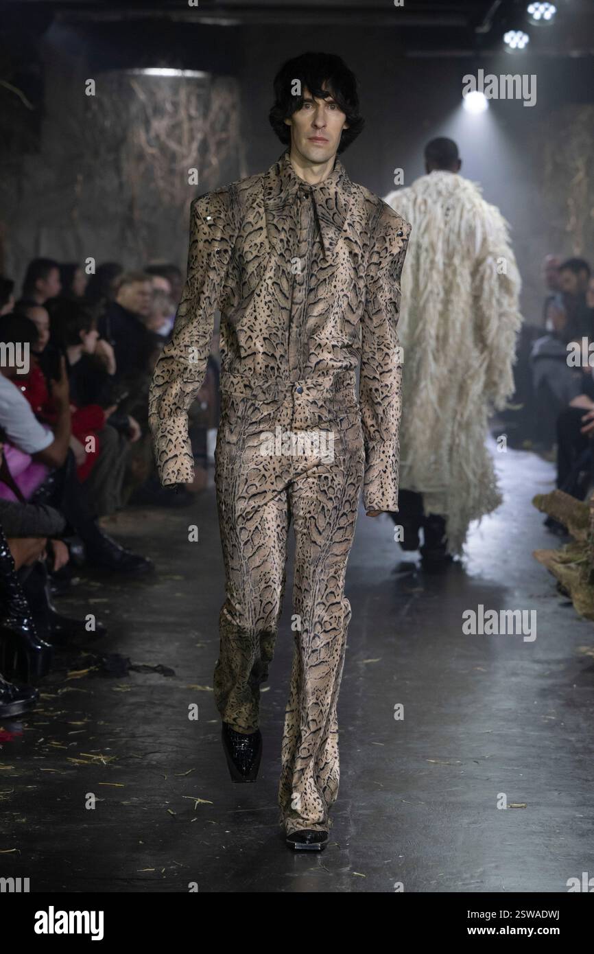 London, UK. 20th Feb, 2025. A model walks on the runway during the ...