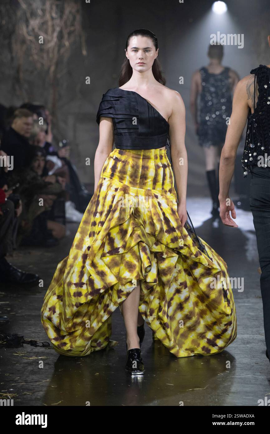 London, UK. 20th Feb, 2025. A model walks on the runway during the ...