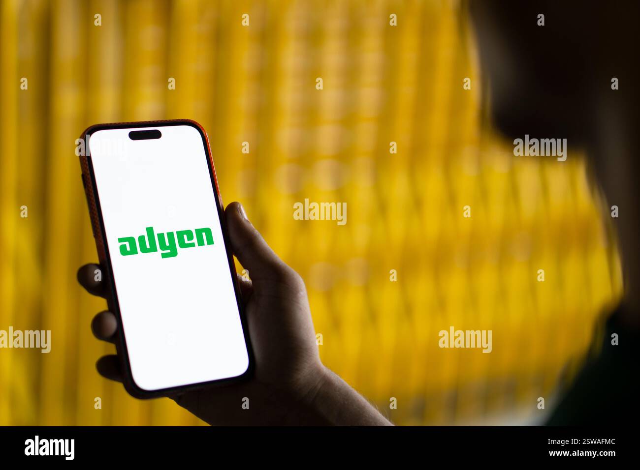 Dhaka, Bangladesh- 09 Nov 2024: Adyen logo is displayed on smartphone. Adyen is a Dutch payment ...