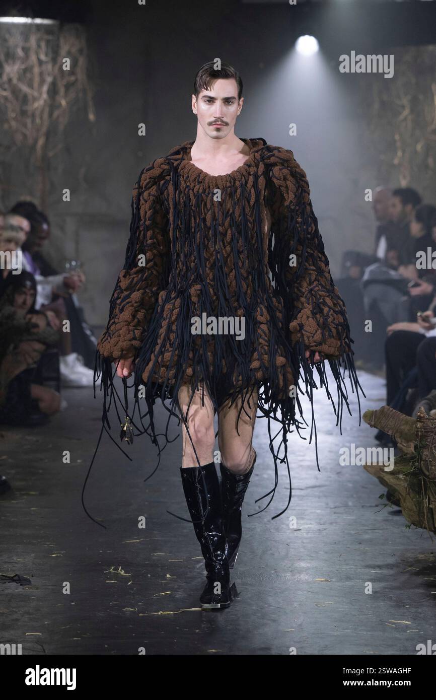 A model walks on the runway during the Maximillian Rayner Ready to Wear ...