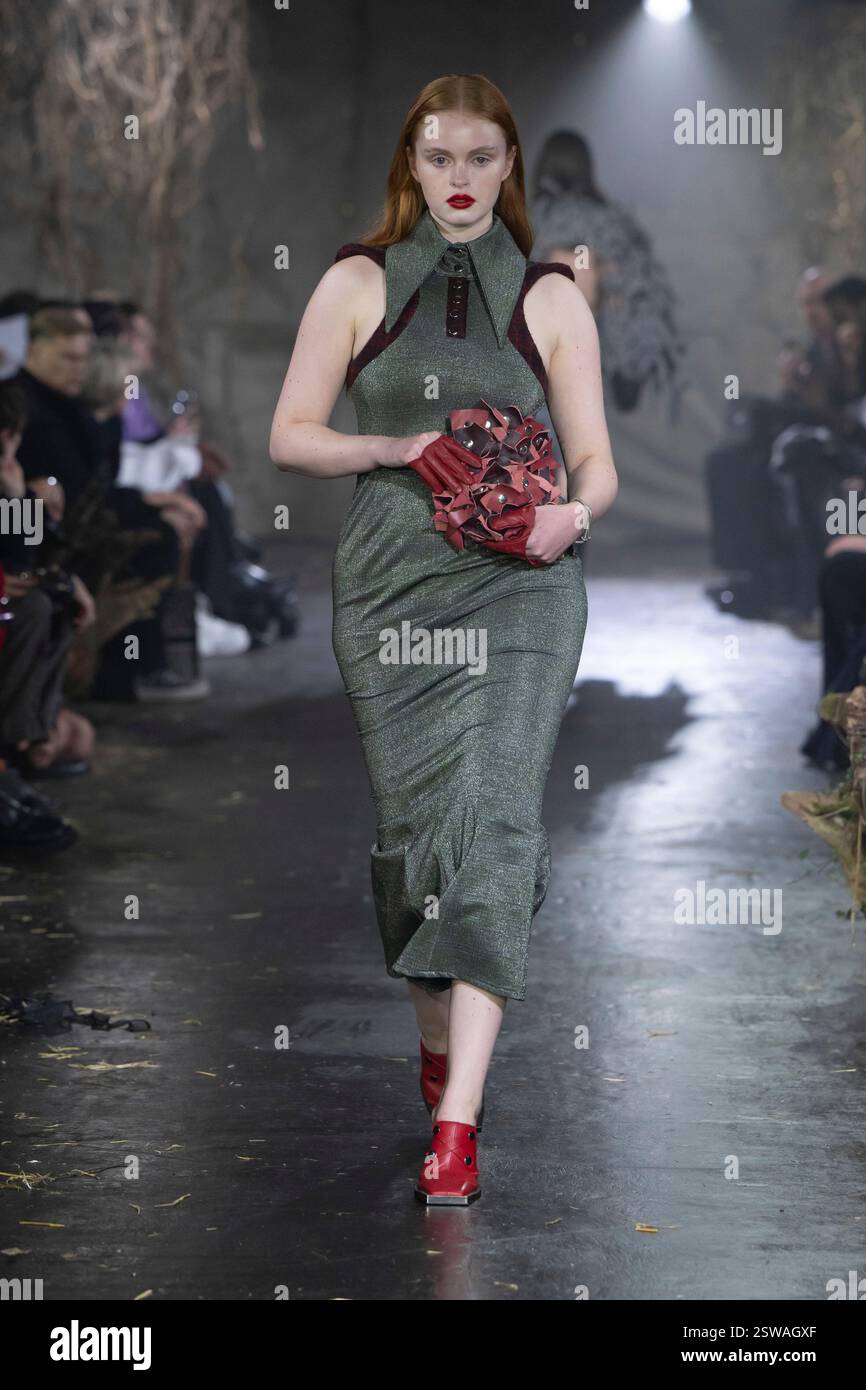 London, UK. 20th Feb, 2025. A model walks on the runway during the ...