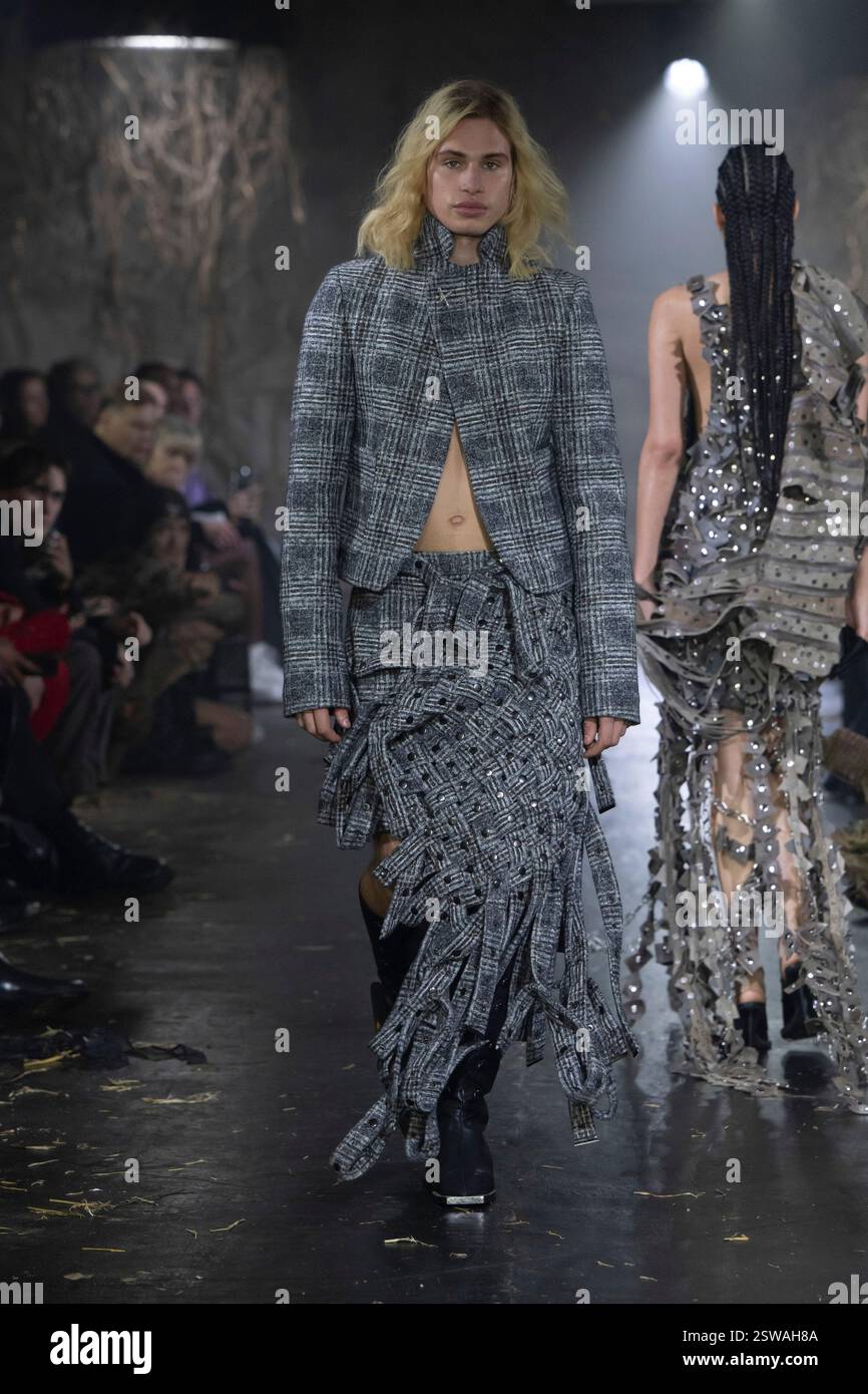 London, UK. 20th Feb, 2025. A model walks on the runway during the ...