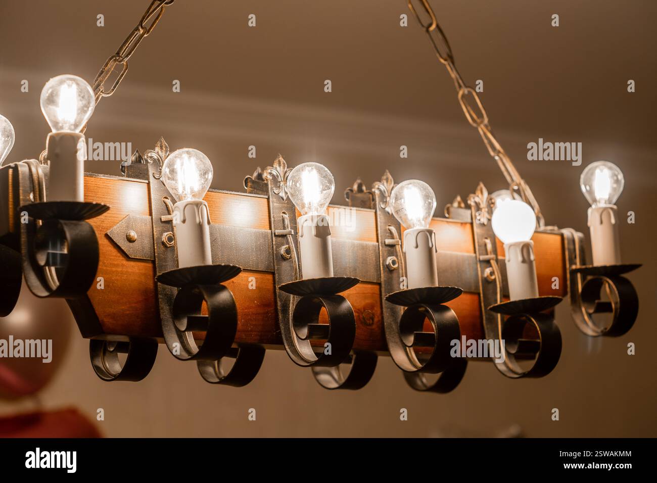 Industrial style ceiling light fixture with multiple bulbs illuminating ...