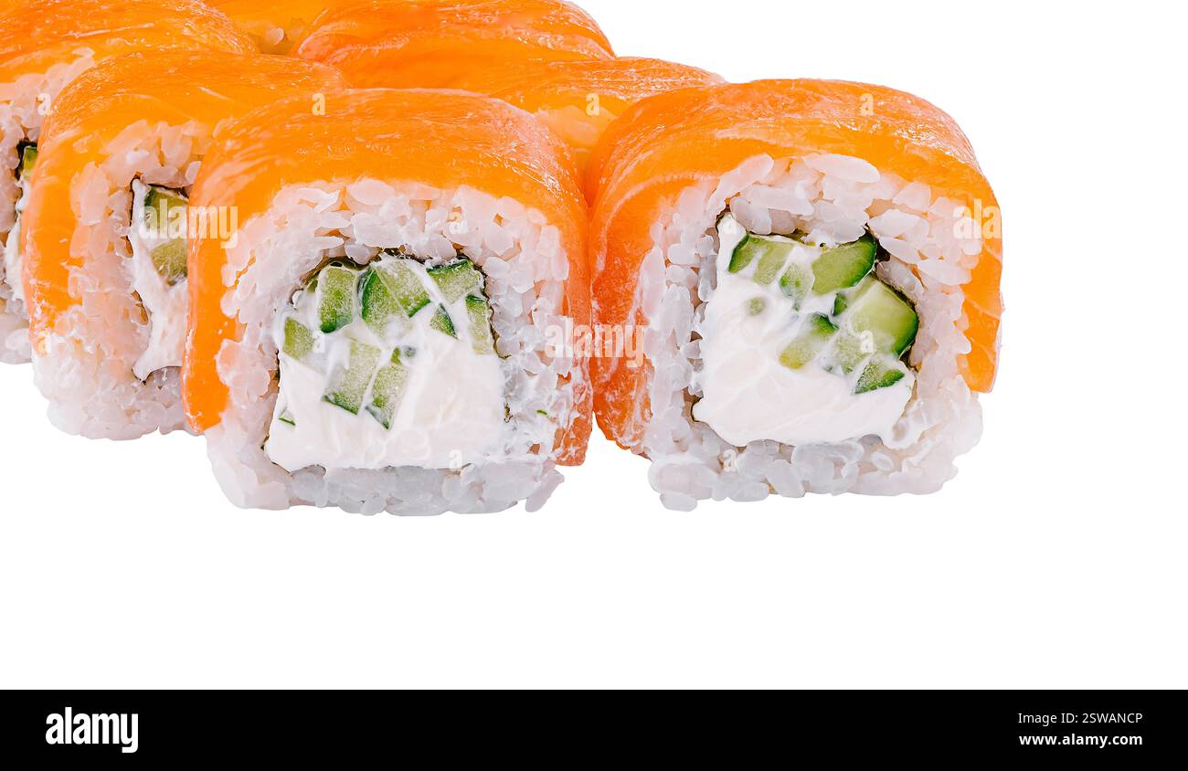 Philadelphia sushi rolls with salmon and cucumber standing on white ...