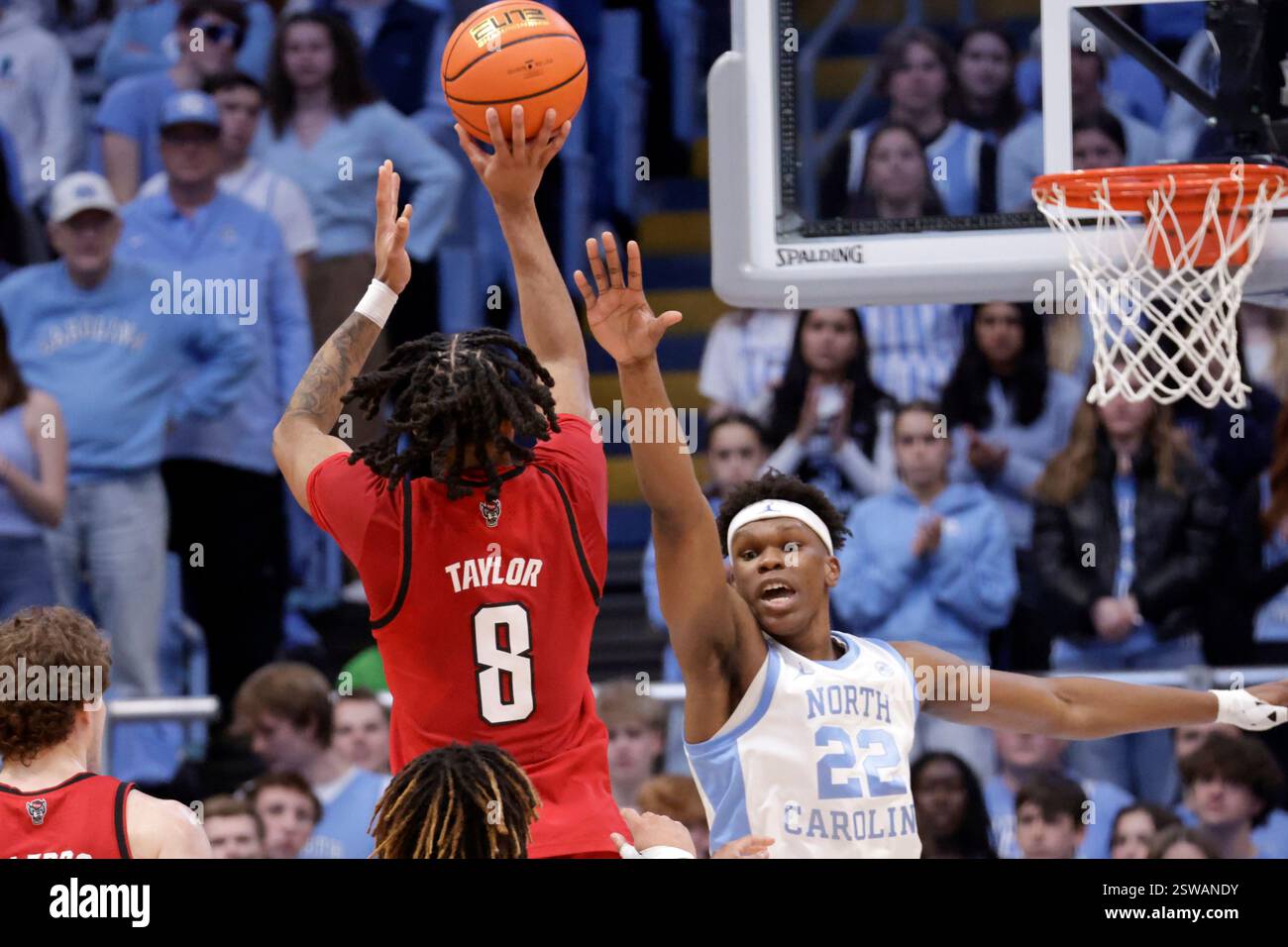 North Carolina State guard Jayden Taylor (8) attempts a shot as North ...