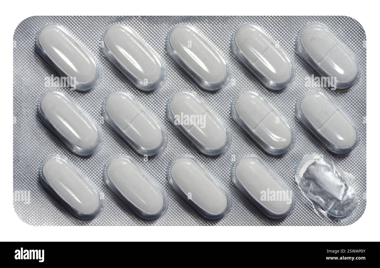 Oval white tablets in blister pack on isolated background Stock Photo ...