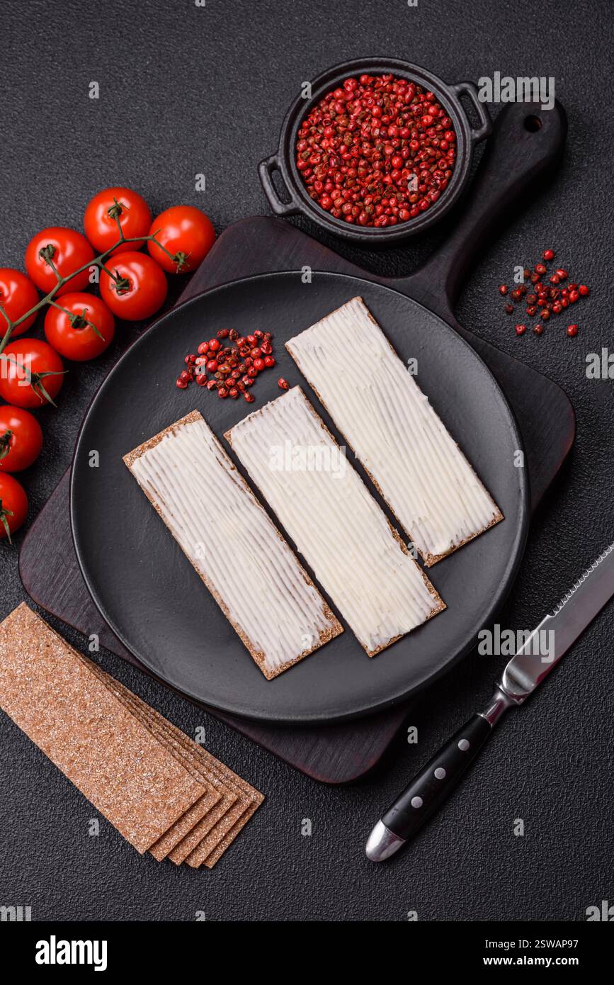 Rectangular whole grain crisp bread with cream cheese Stock Photo - Alamy