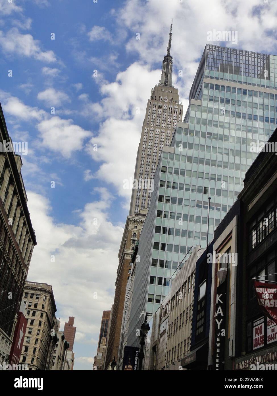 Urban design street with a Kay sign amidst skyscrapers in metropolitan ...