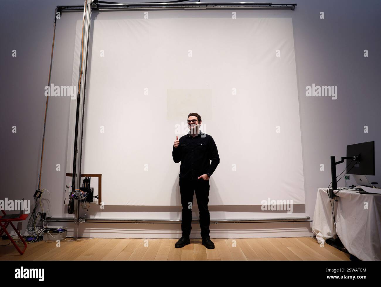 New York, United States. 20th Feb, 2025. Artist Alexander Reben stands ...