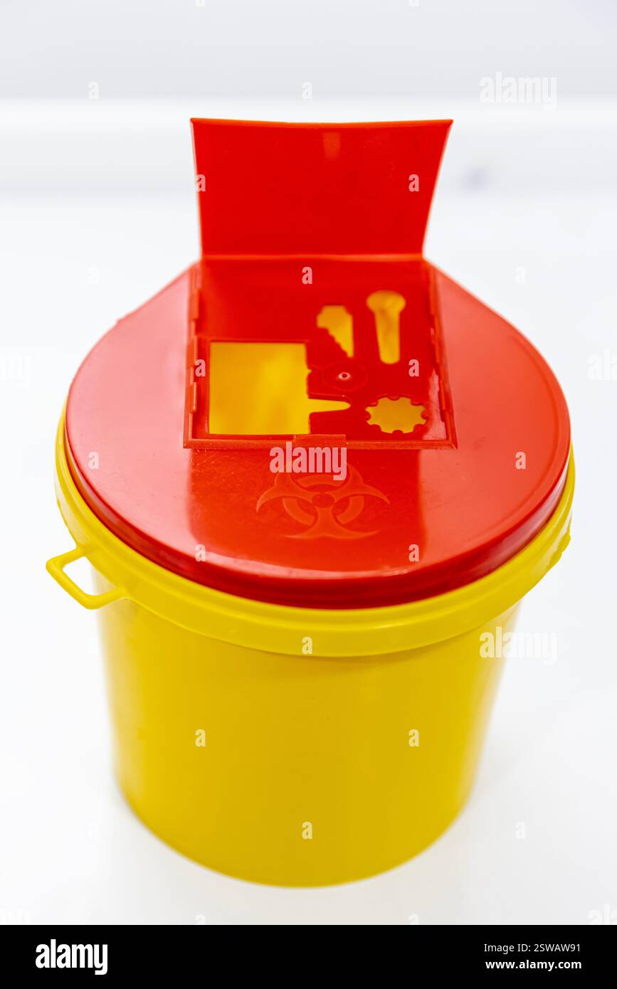 Plastic containers for medical waste disposal on white background ...