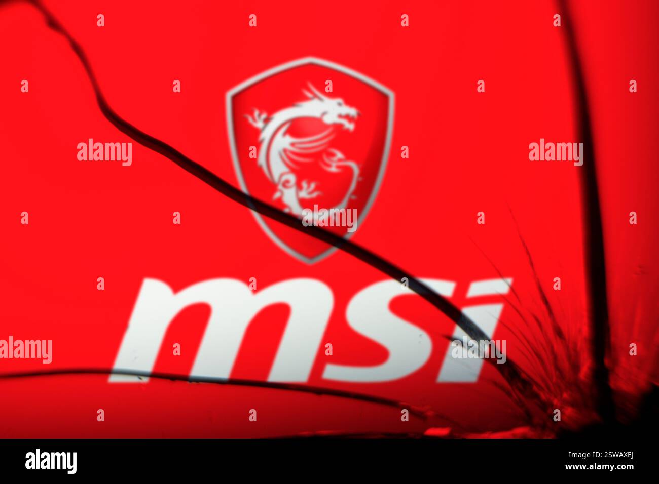 Dhaka, Bangladesh- 17 Nov 2024: Msi logo is visible on the broken glass. MSI is a Taiwanese ...