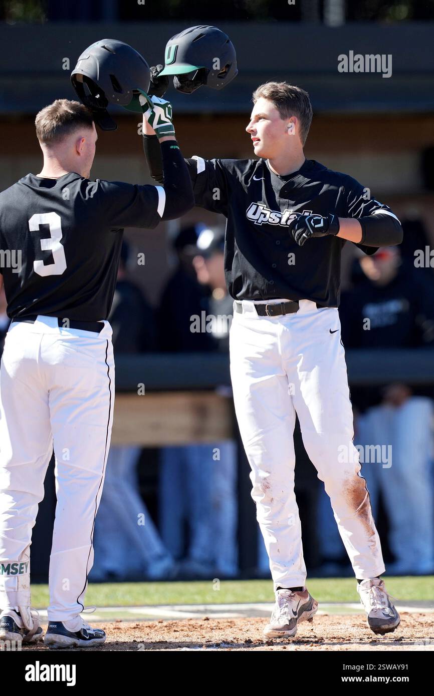Right fielder Henry Zenor (44), right, of the USC Upstate Spartans is ...