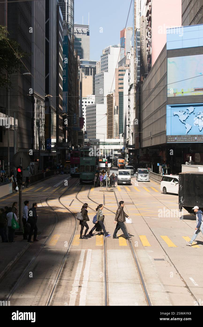 Pedestrians cross a street in Hong Kong Douglas Street, Central Stock ...