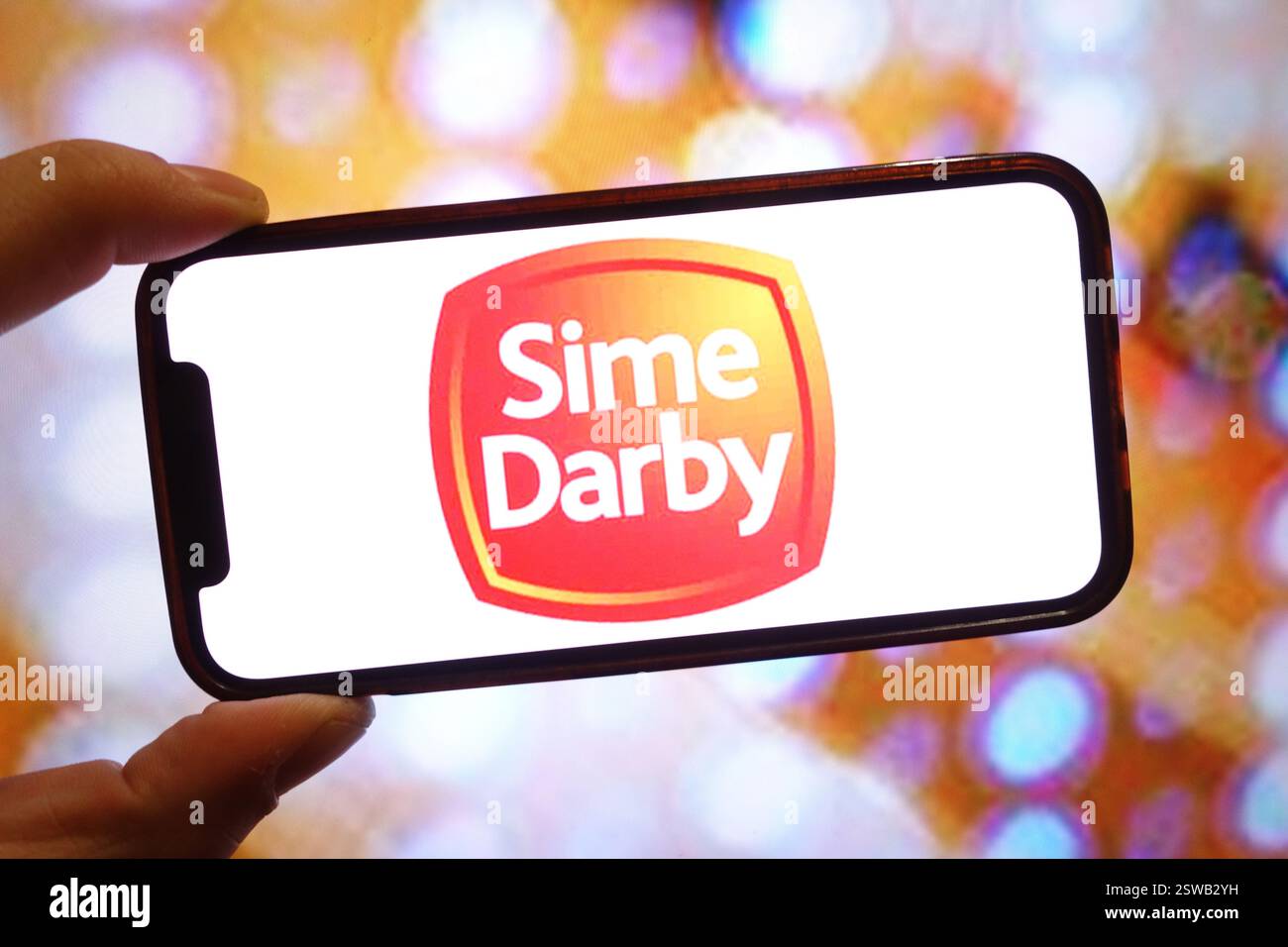 In this photo illustration, the Sime Darby Plantation company logo is ...