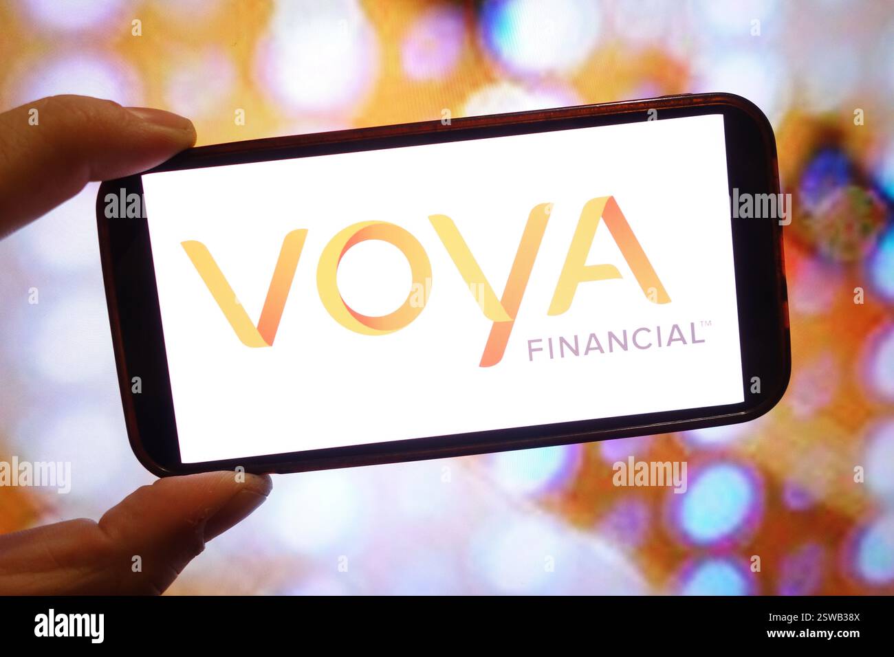 In this photo illustration, the Voya Financial Inc company logo is seen ...