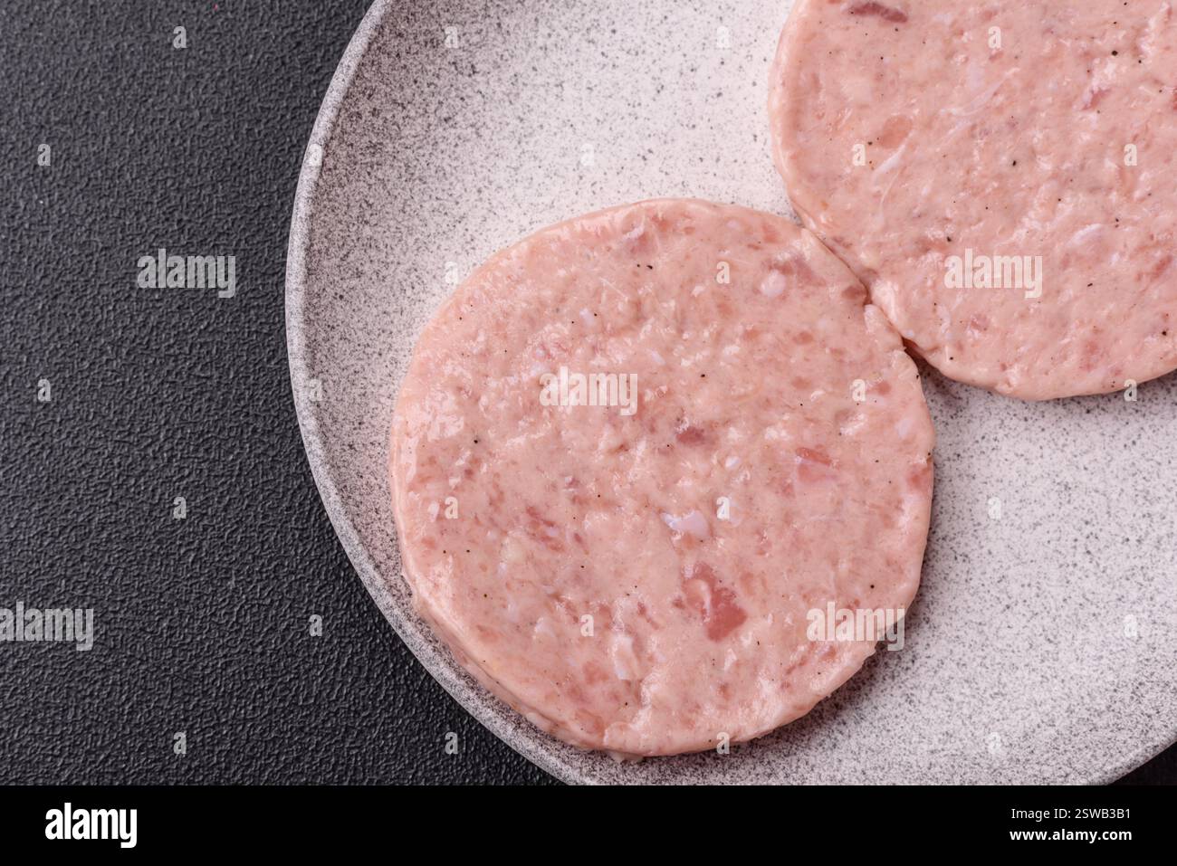 Raw chicken burger cutlet salt hi-res stock photography and images - Alamy