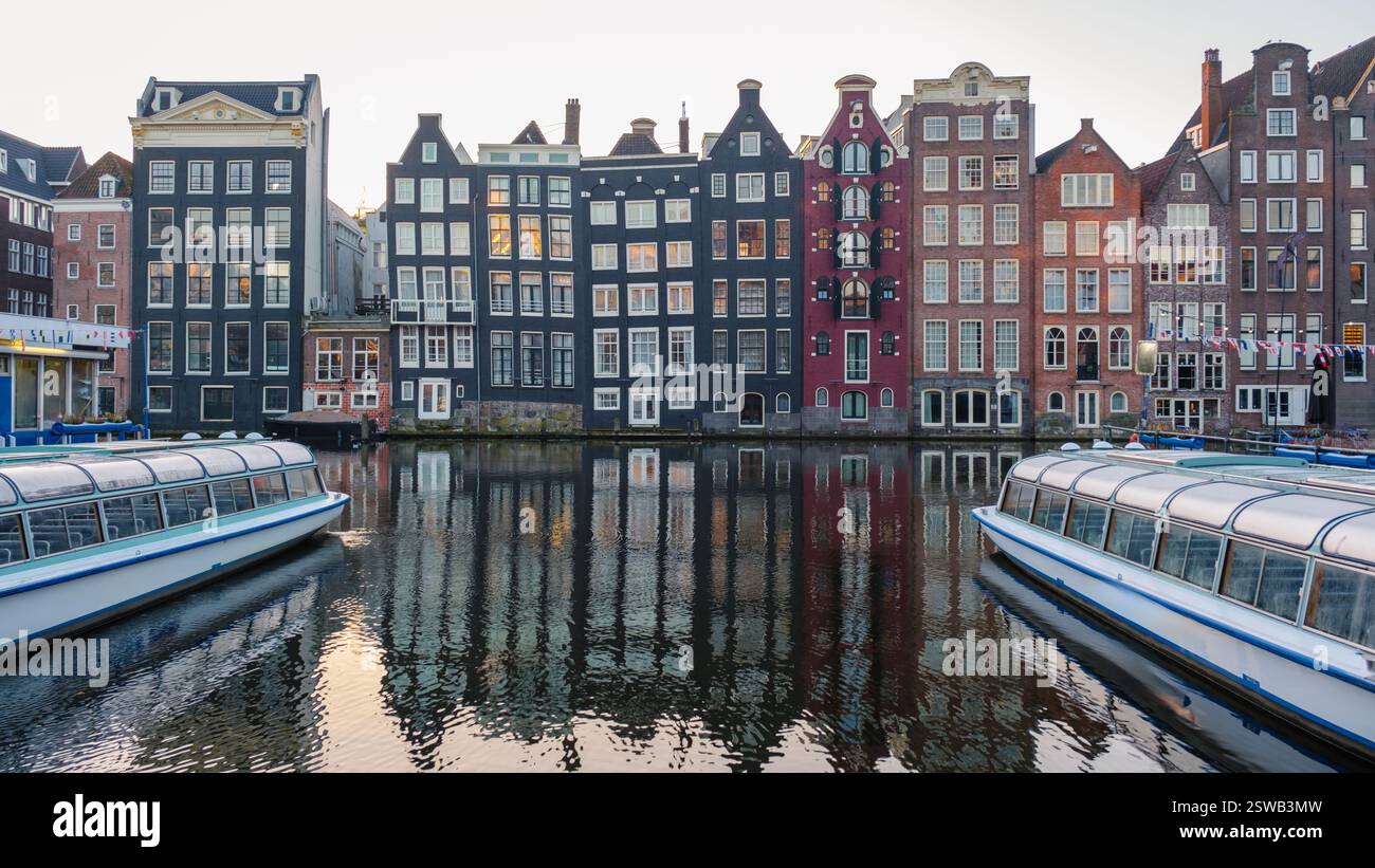 As leaves turn golden, the iconic canals of Amsterdam display charming ...