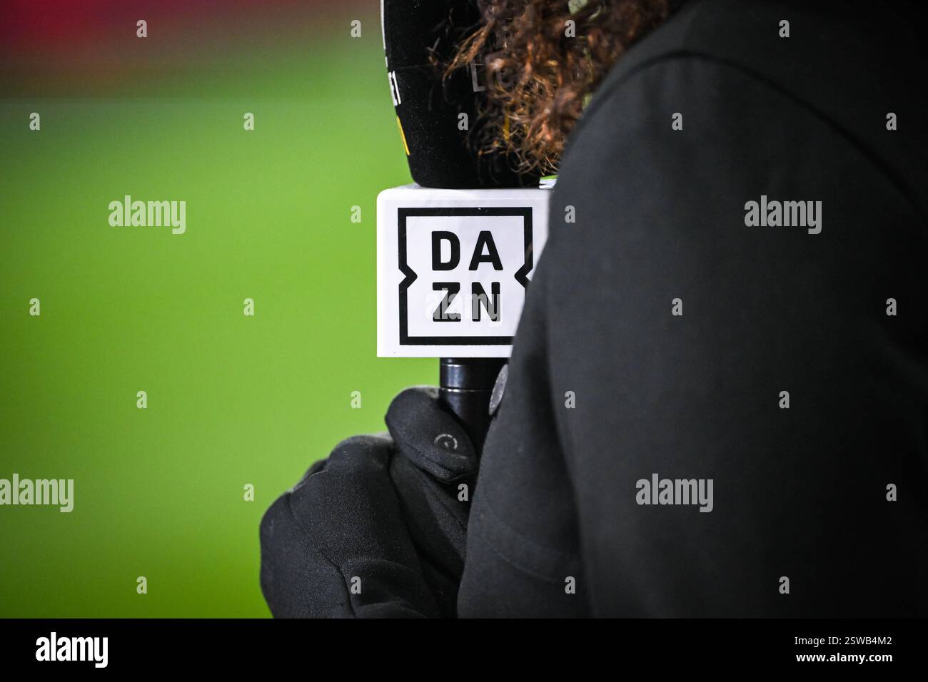 Illustration of the microphone with the official logo of DAZN during ...