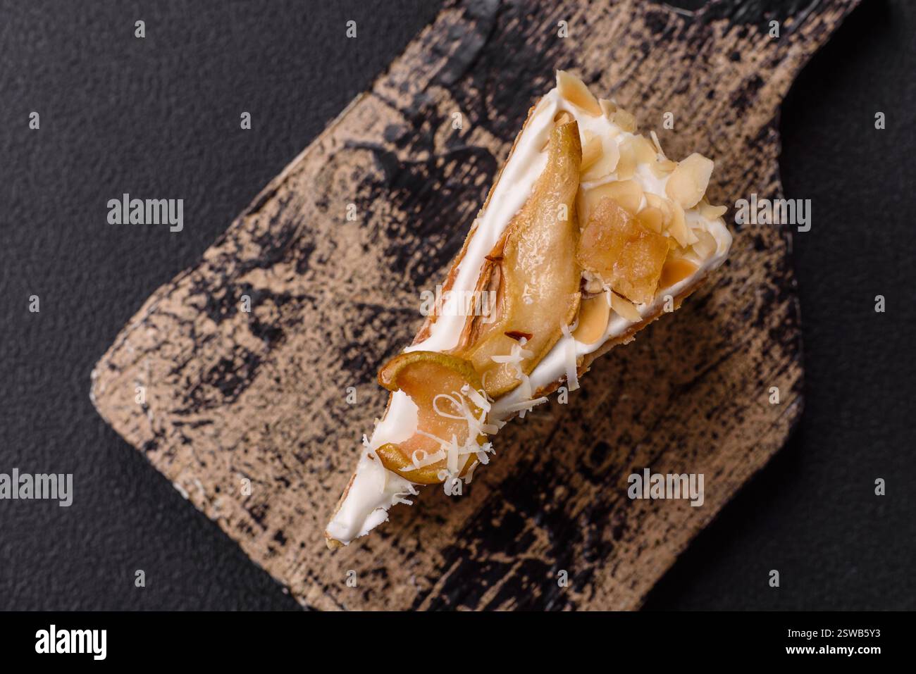 Layered sweet cake with cream, pear and dorblu cheese Stock Photo - Alamy