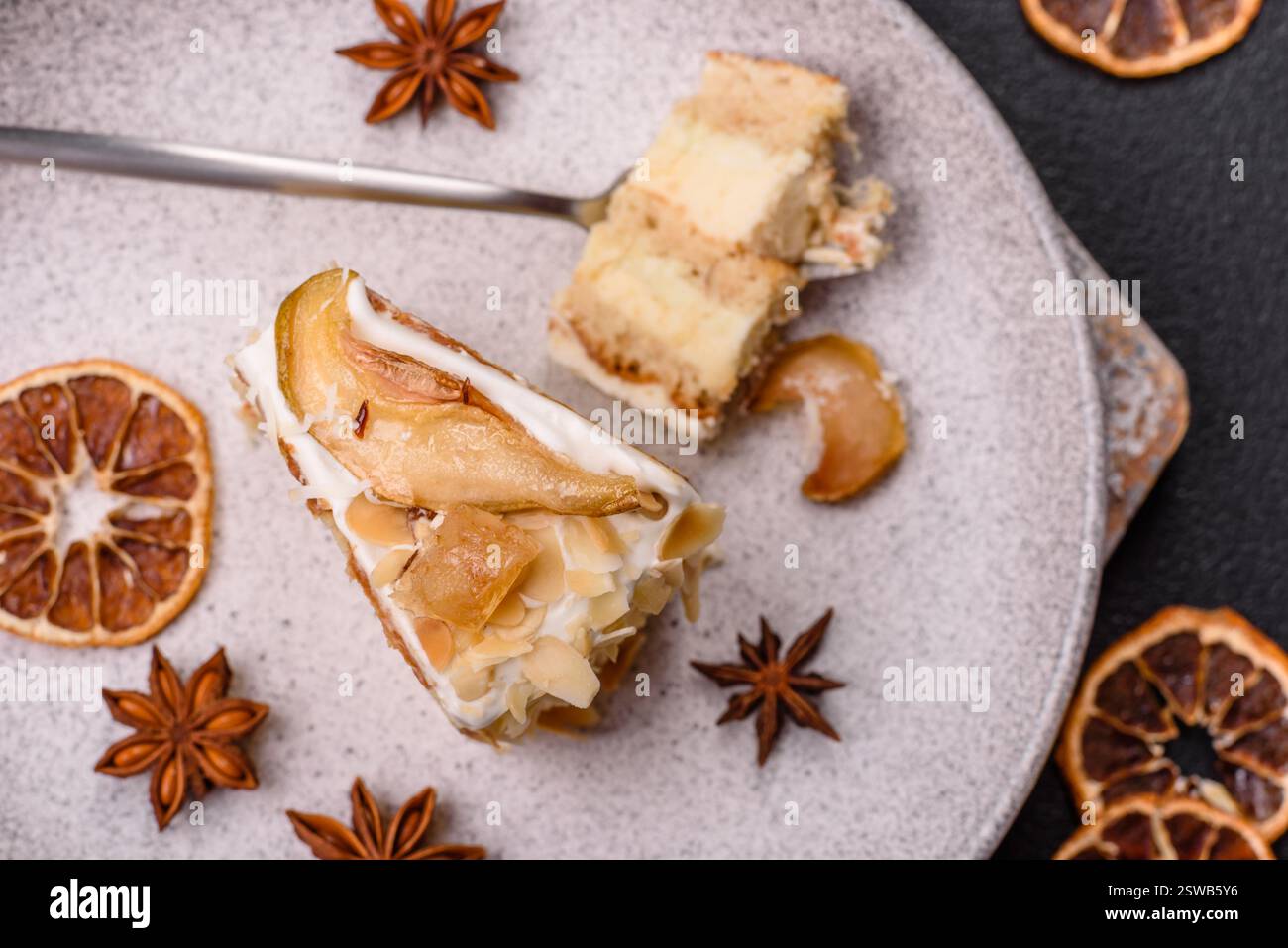 Layered sweet cake with cream, pear and dorblu cheese Stock Photo - Alamy