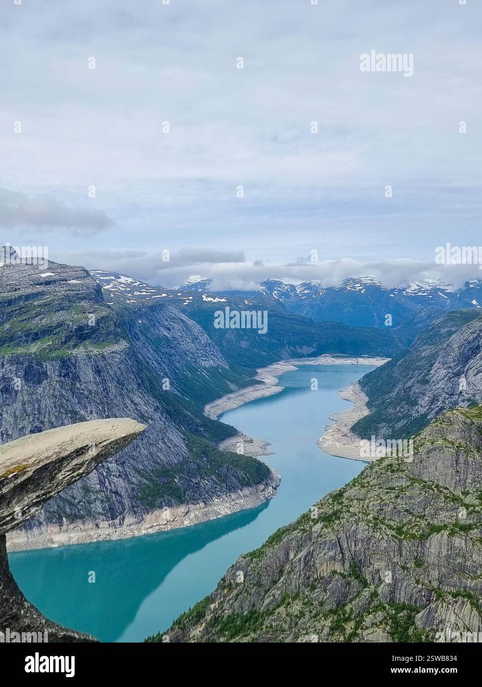 A breathtaking landscape reveals a twisting river cutting through ...