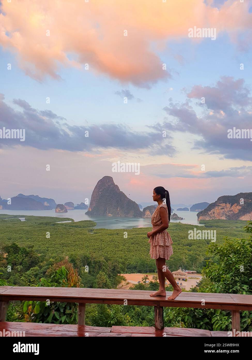Woman enjoying breathtaking coastal hi-res stock photography and images - Alamy