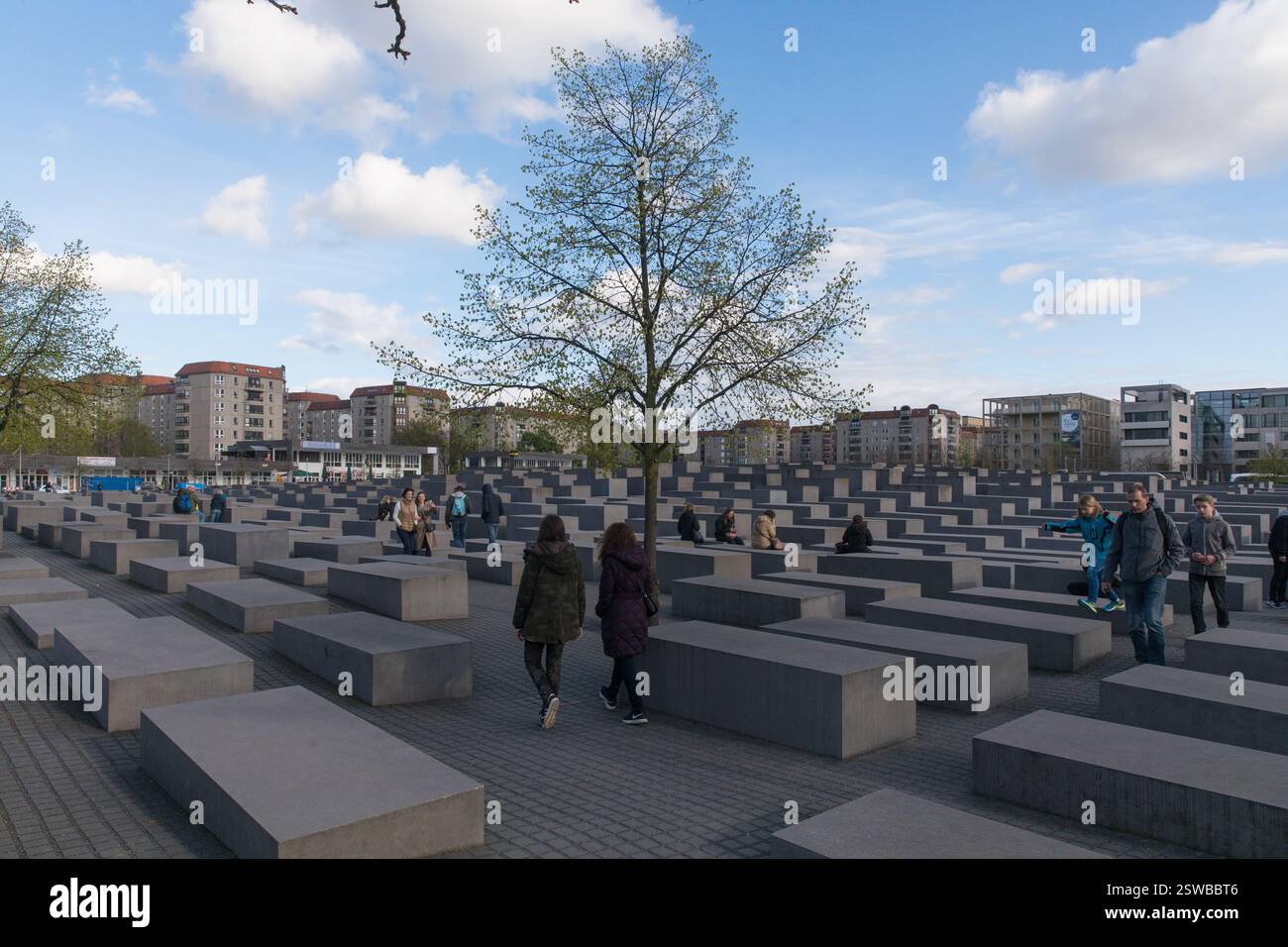 Visitors at the Holocaust Memorial (Holocaust-Mahnmal) in Berlin ...