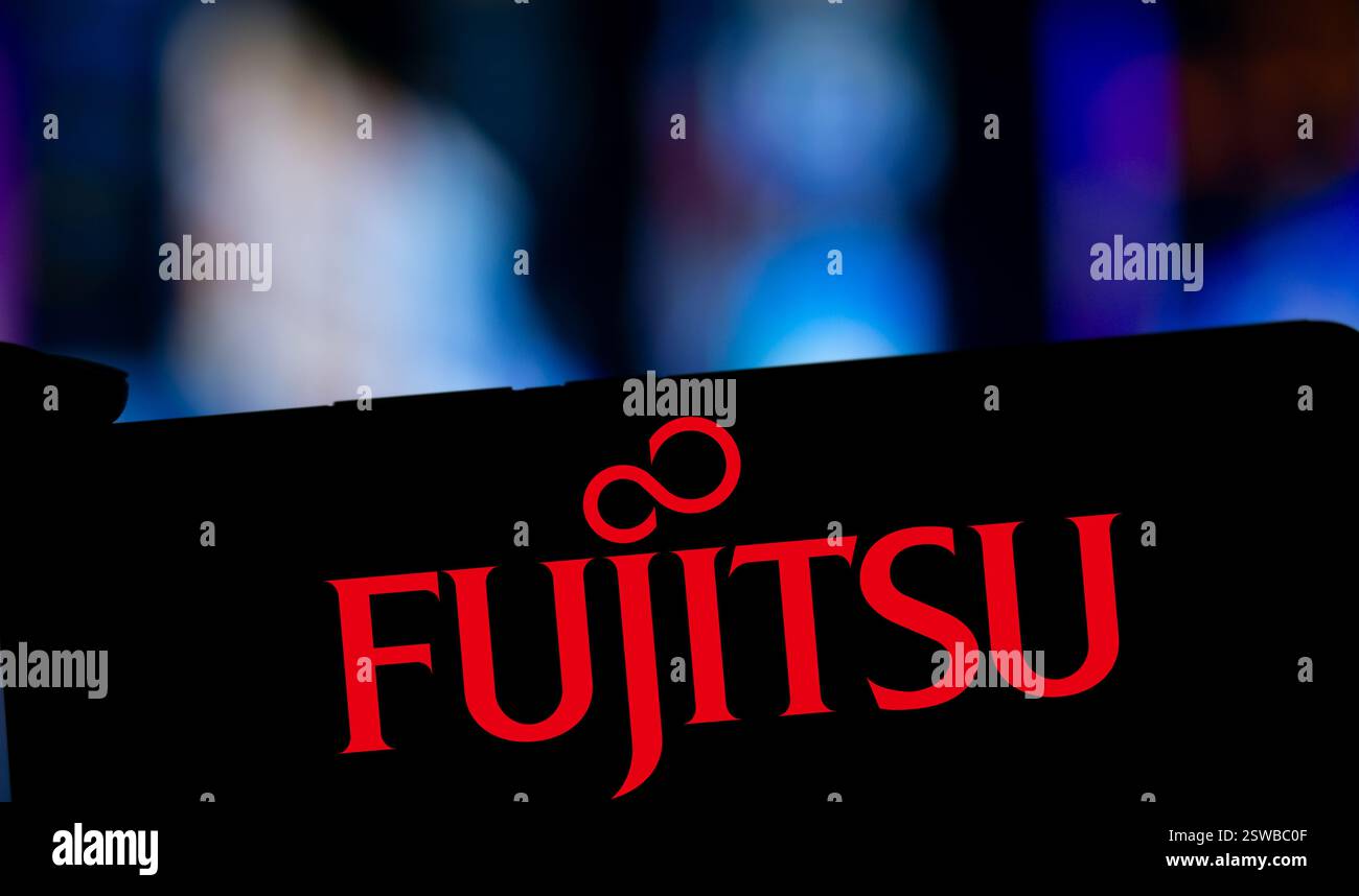 Dhaka, Bangladesh- 24 Nov 2024: Fujitsu logo is displayed on smartphone. Fujitsu limited is a ...