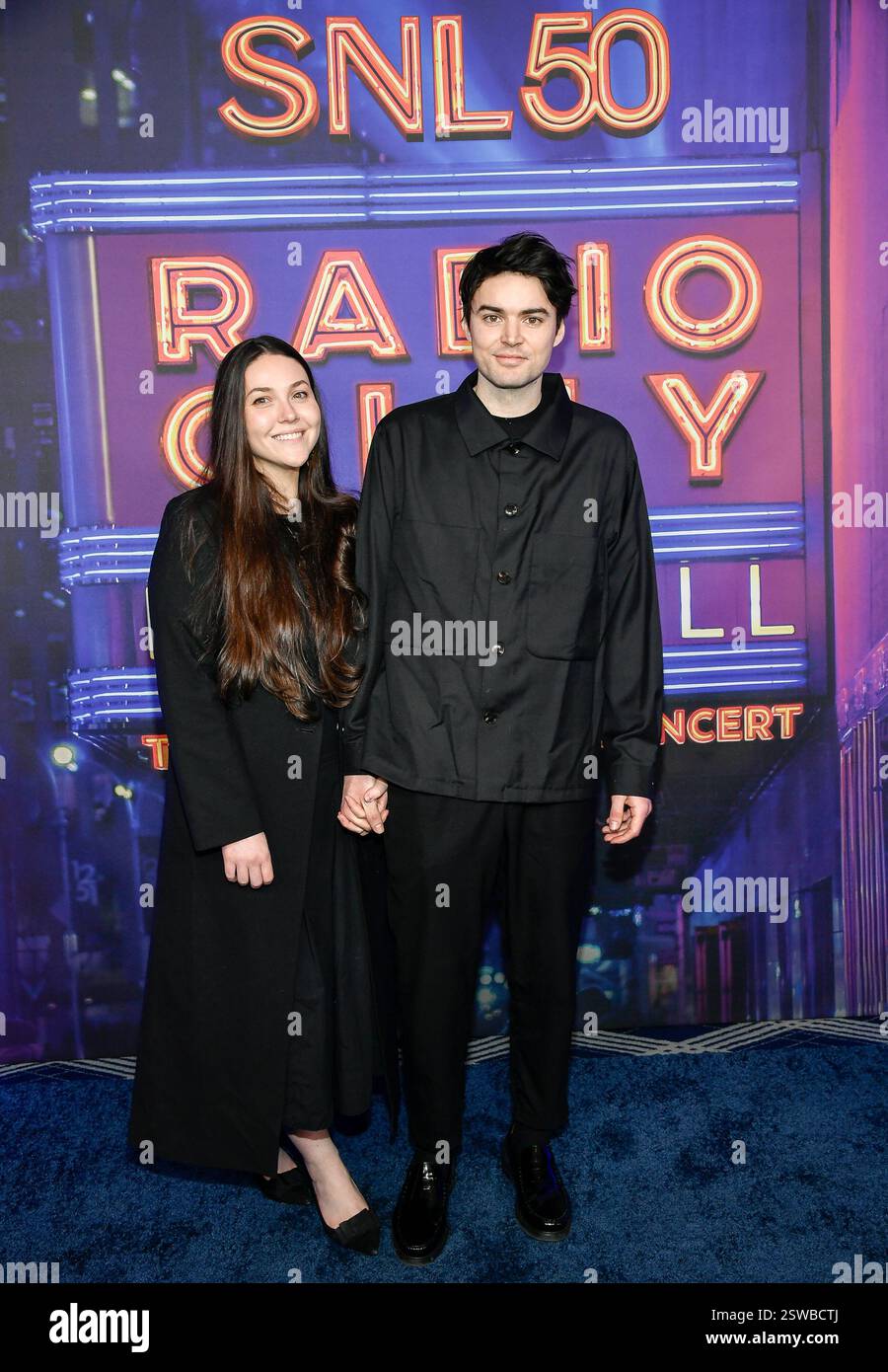 Michael Longfellow, right, and guest attend the SNL50: The Homecoming ...