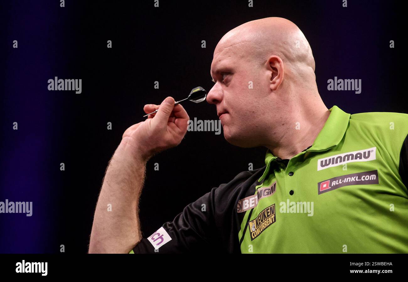 Michael van Gerwen during his match against Nathan Aspinall on night ...