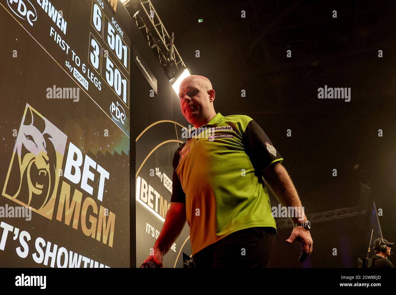 Michael van Gerwen walks off after losing his match against Nathan ...