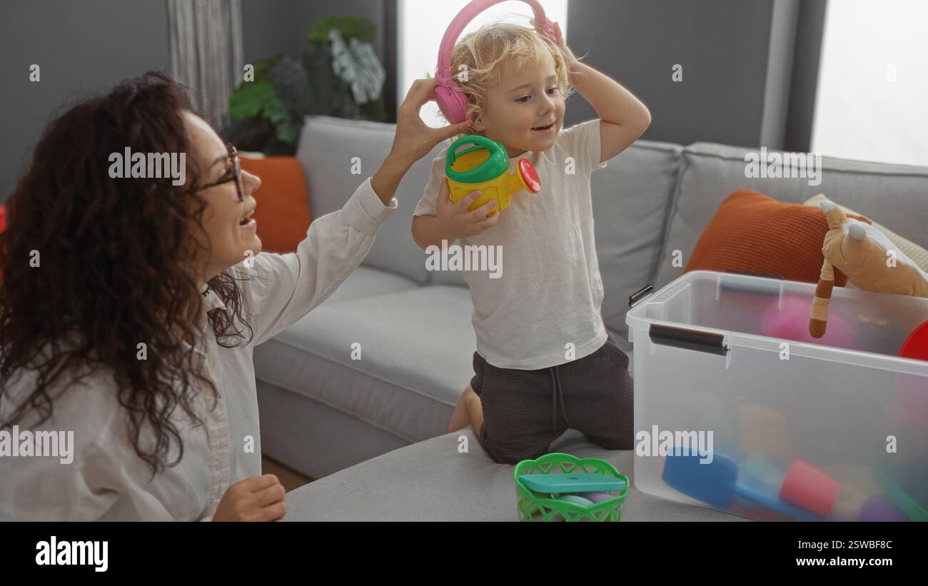 Mother and son enjoying playtime together in a cozy living room filled ...