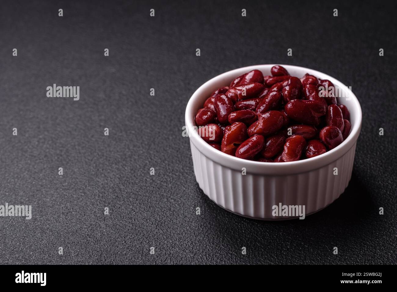 Delicious nutritious canned red beans, with salt and spices Stock Photo ...