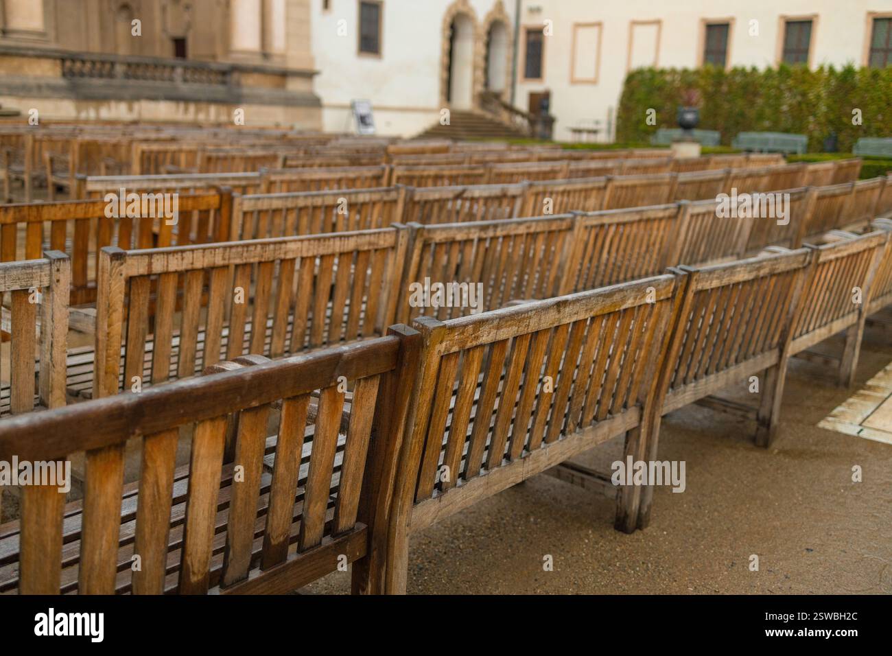 A modern wooden benches standing in the park. Comfortable bench in ...