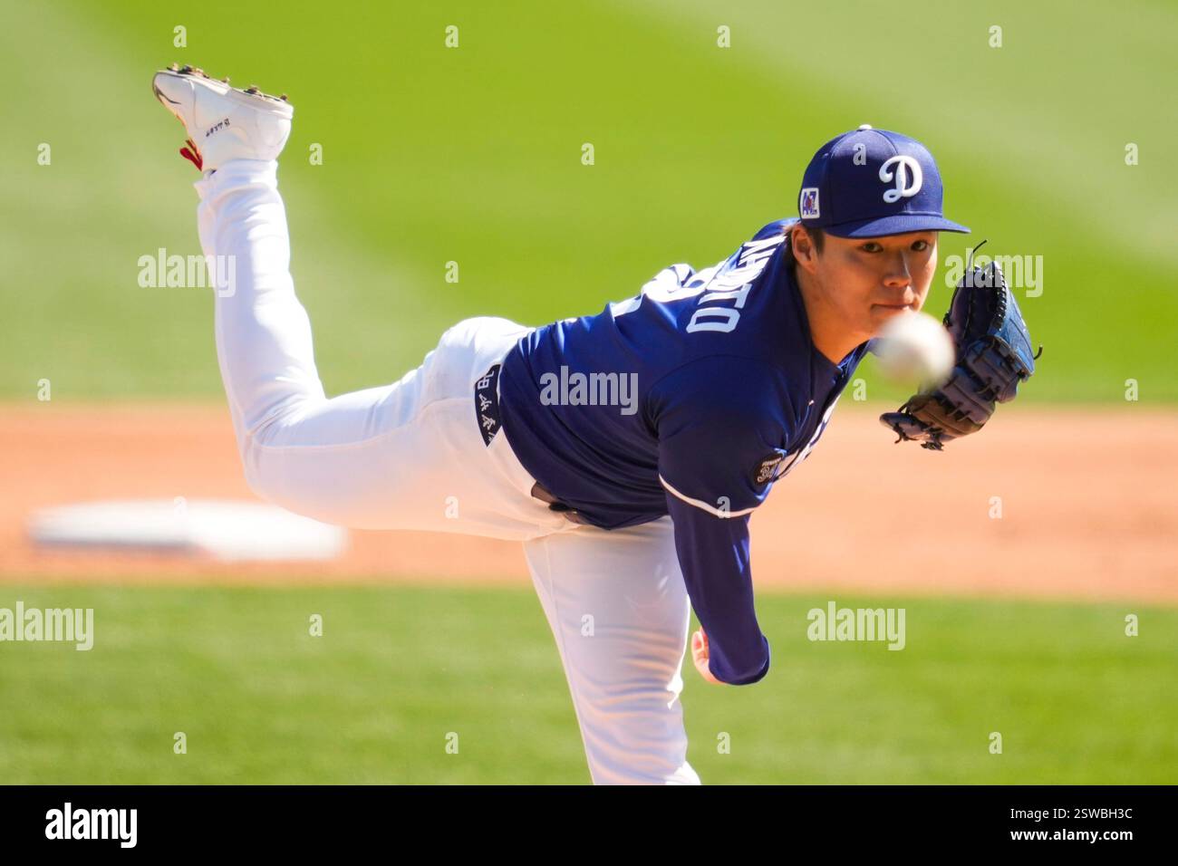 Los Angeles Dodgers pitcher Yoshinobu Yamamoto throws during the second ...
