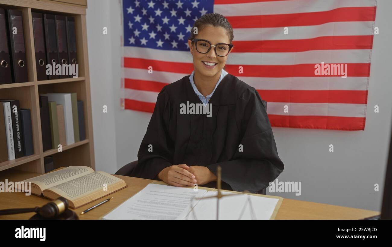 Young brunette hispanic woman judge smiles in an office setting with an ...