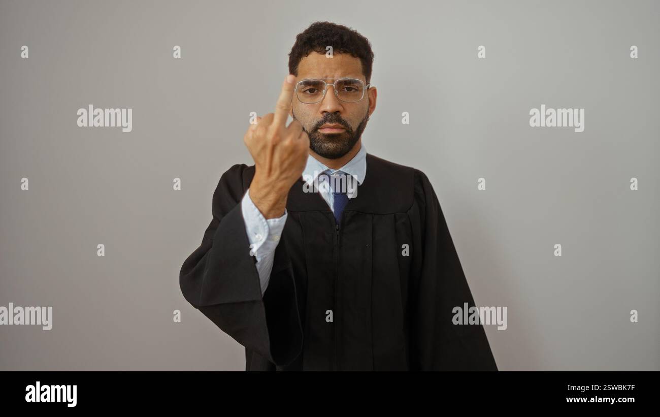 Man wearing glasses and a judge's robe shows rude gesture on isolated ...