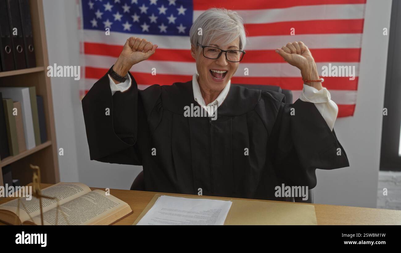Elderly female judge celebrating in office with american flag ...