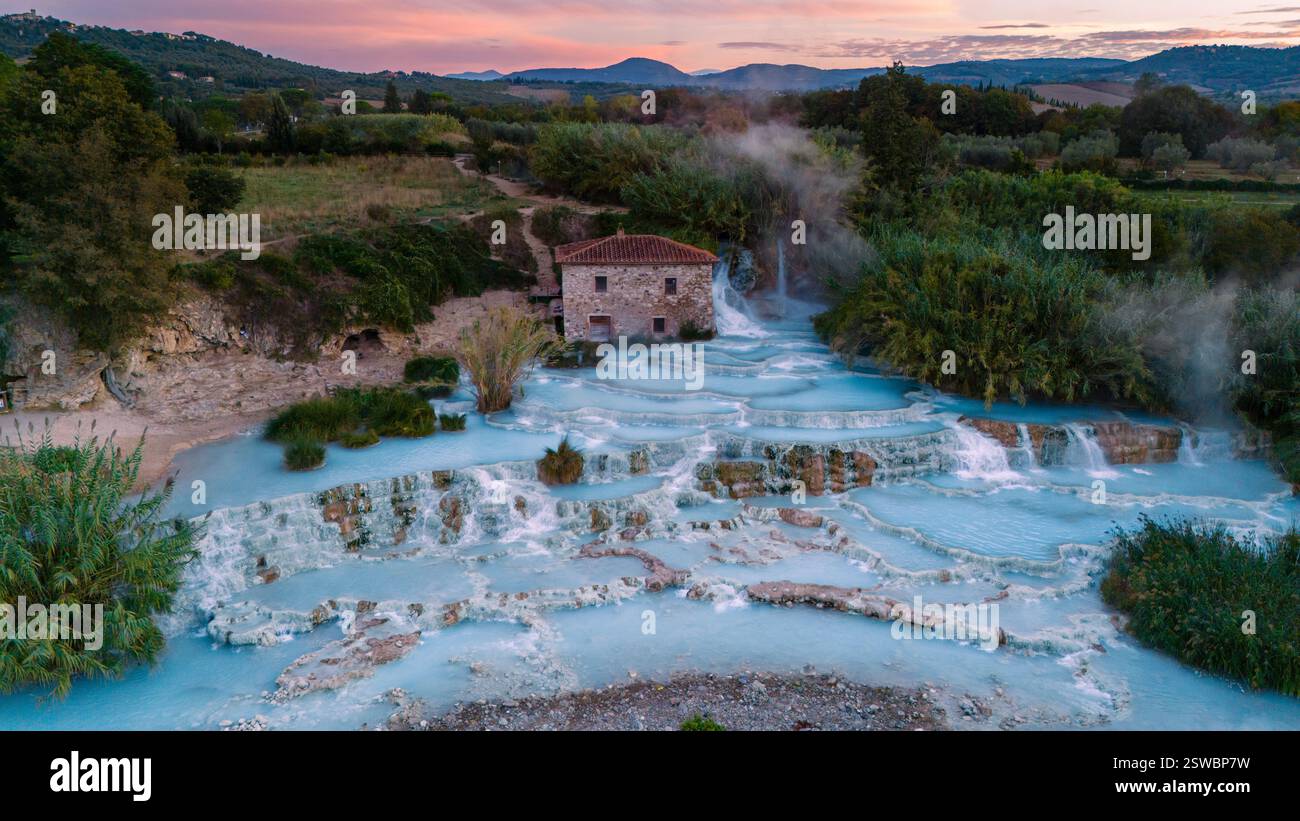 Experience the enchanting serenity of Saturnia thermal baths at sunset ...