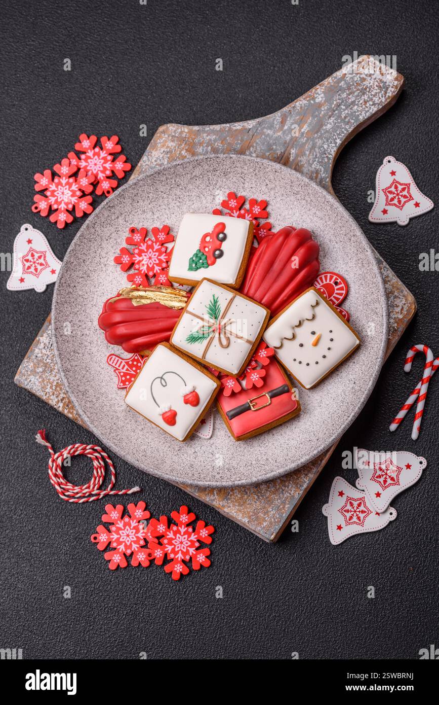 Sweet madeleine sponge cookies covered with colored chocolate Stock ...