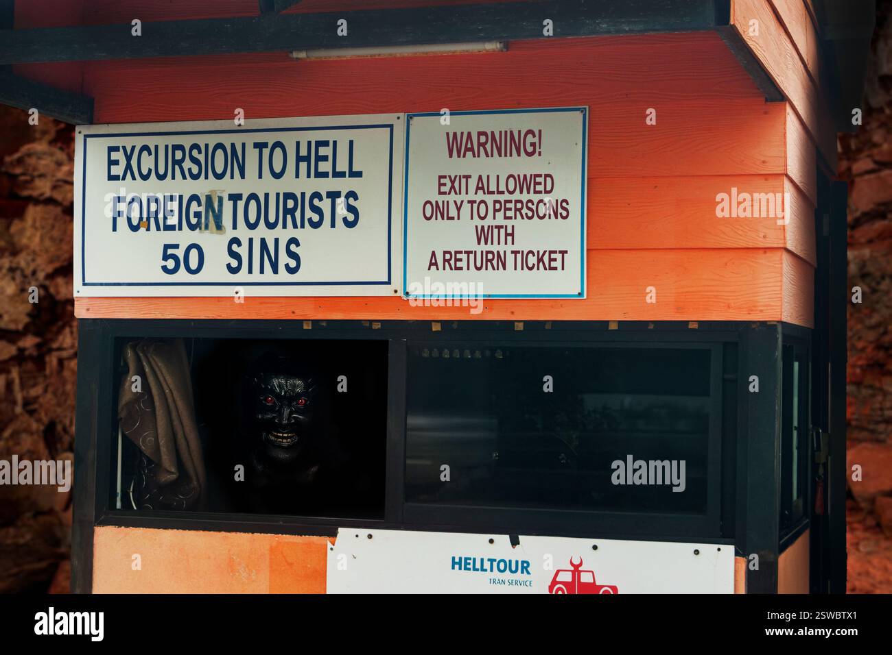 Ticket office for the trip to hell Stock Photo - Alamy
