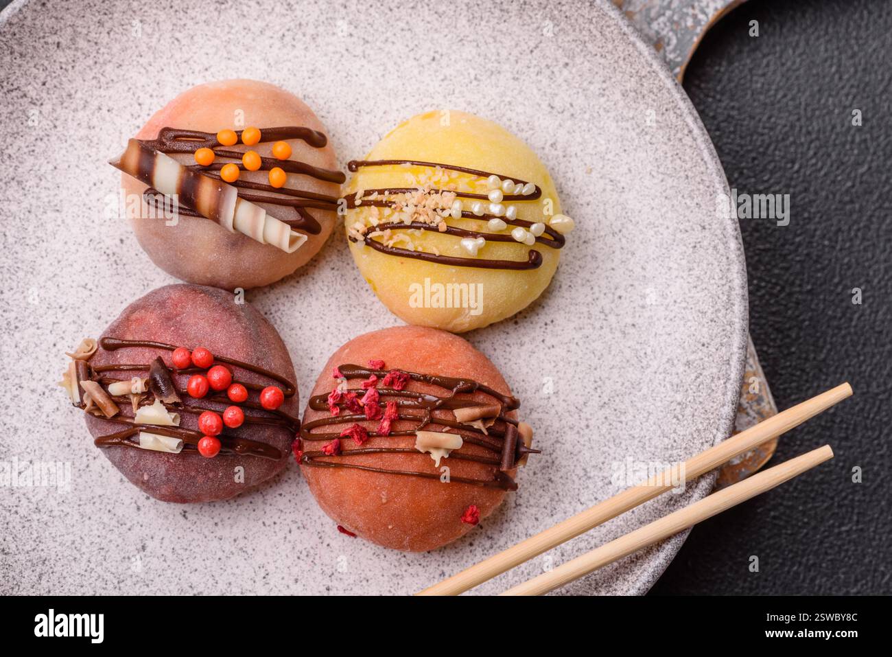 Delicious colorful asian mochi sweets with rice dough shell and fruit ...