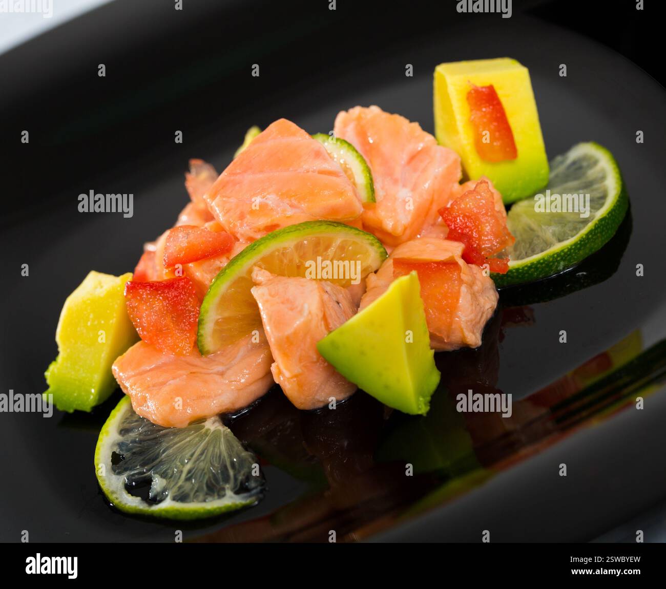 Citrus avocado salmon ceviche Stock Photo - Alamy